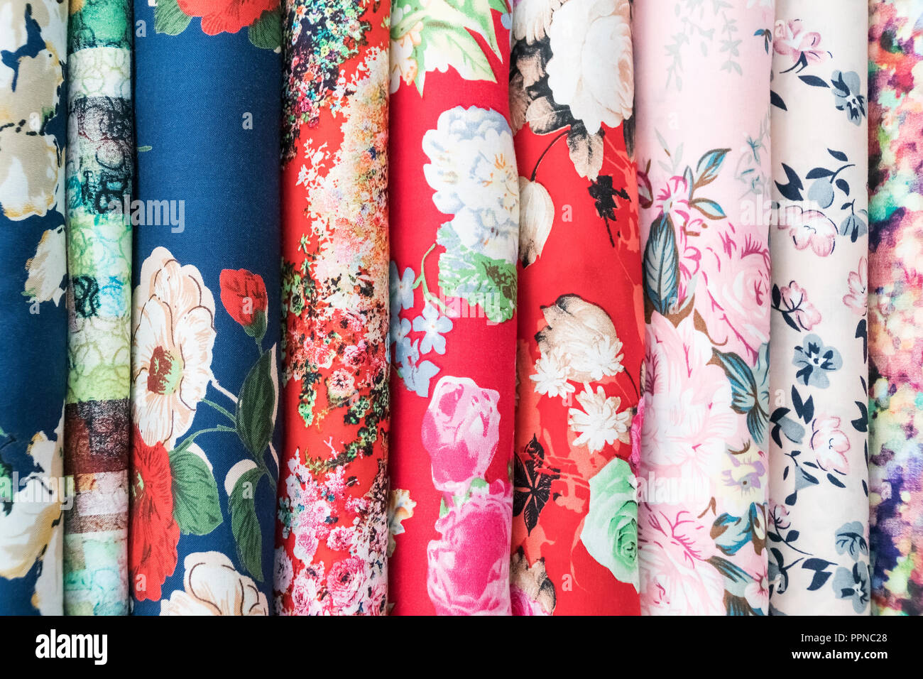 Samples of fabric - printed cotton of different colors on the display ...