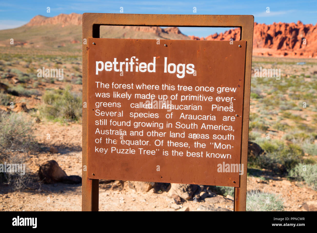 Petrified log sign, Valley of Fire State Park, Nevada Stock Photo - Alamy