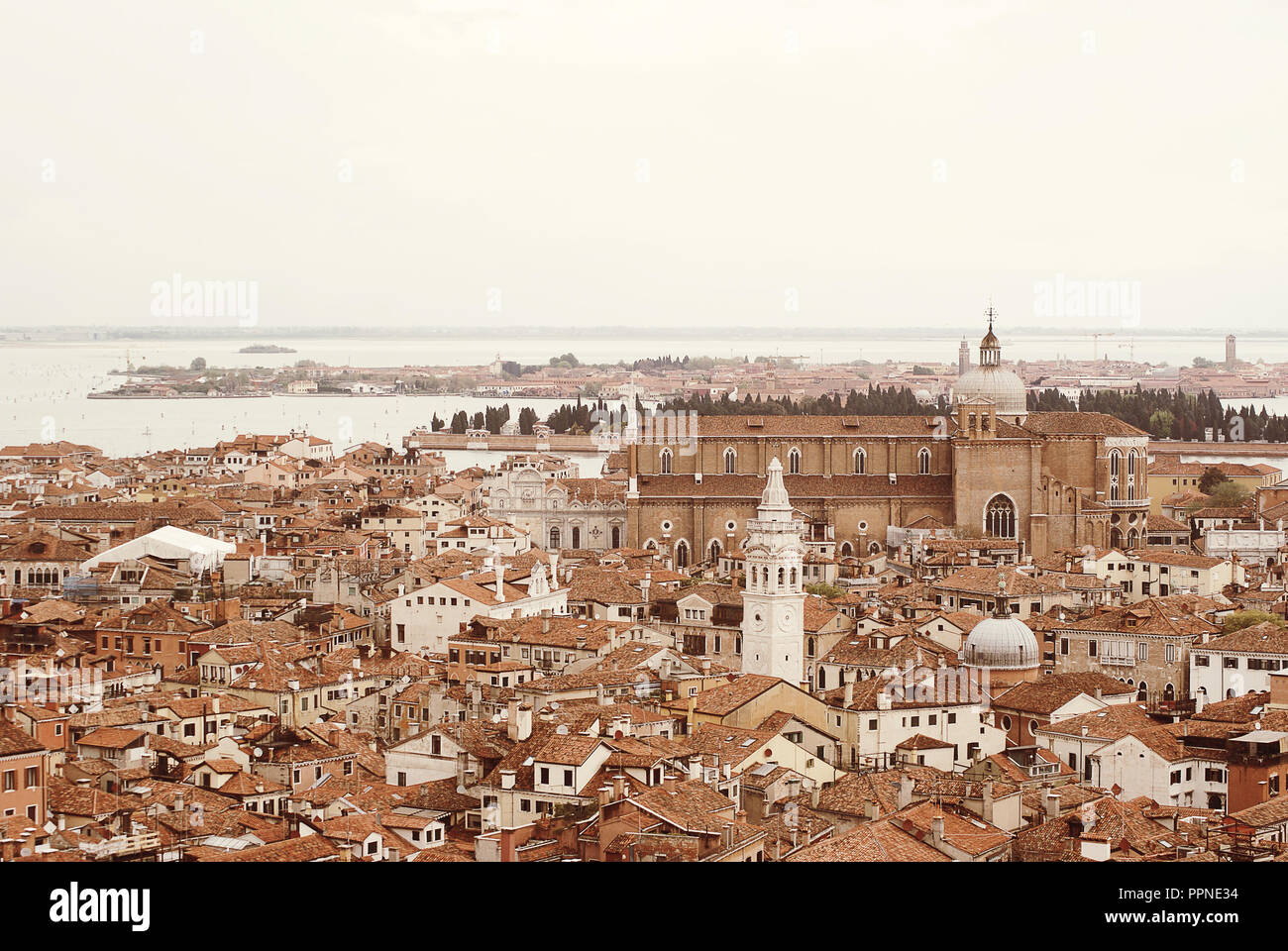 Venice roofs from above. Aerial view of houses, sea and palaces from ...