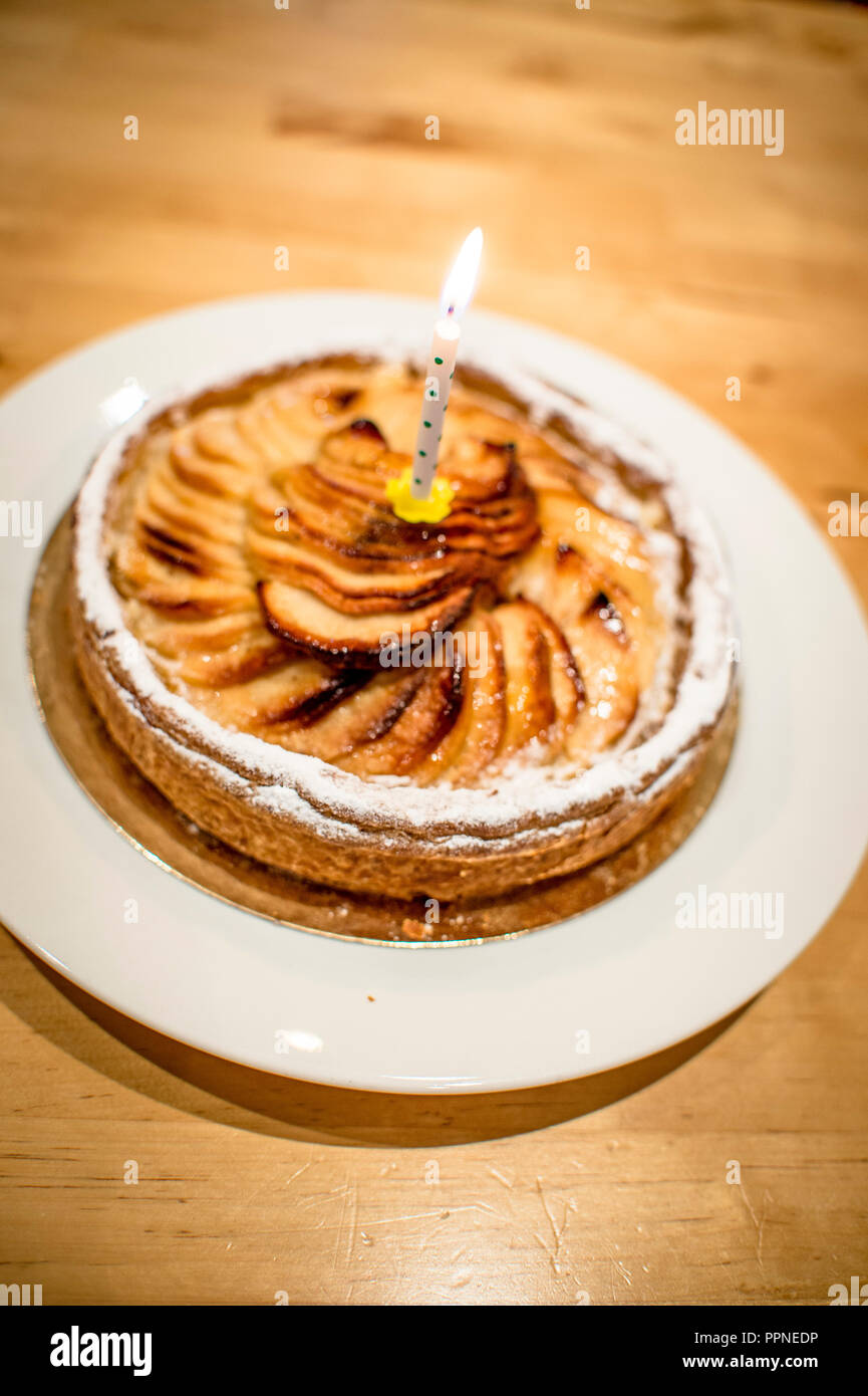 birthday cake with one candle Stock Photo - Alamy