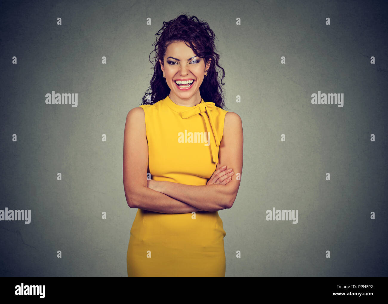 Bright confident woman in yellow dress looking super happy and excited ...