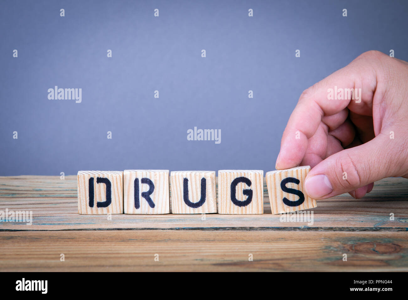 drugs. Wooden letters on the office desk Stock Photo - Alamy