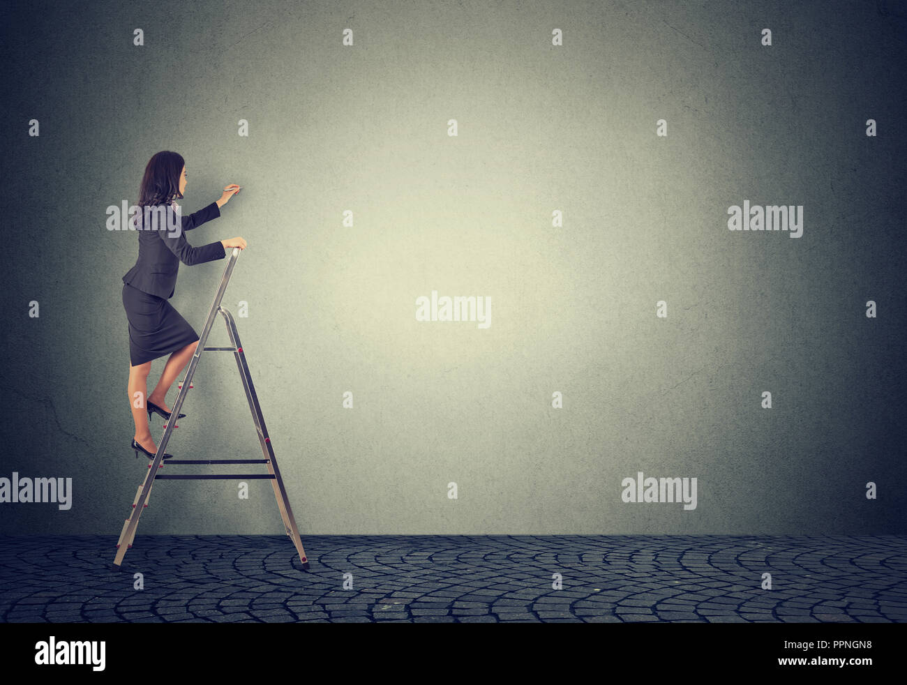 Woman climbing corporate ladder hi-res stock photography and images - Alamy