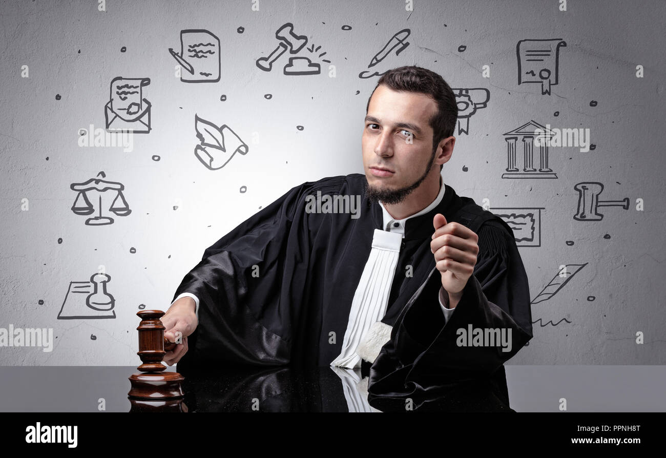 Handsome judge with court symbols around Stock Photo - Alamy