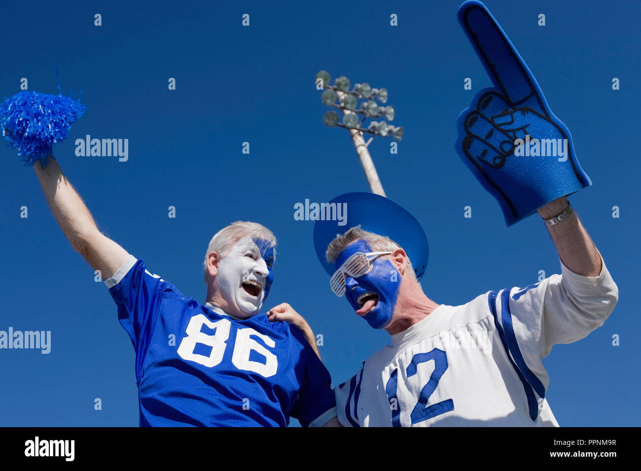 Two senior football fans hi-res stock photography and images - Alamy