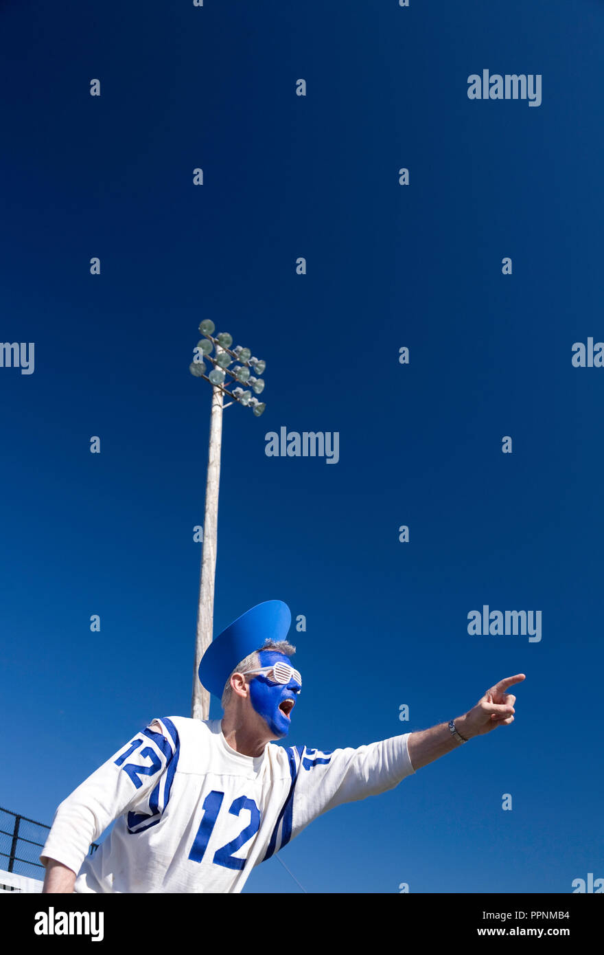 Football fans spectator sun bright blue hi-res stock photography and ...