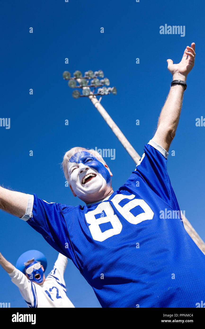 Football fans spectator sun bright blue hi-res stock photography and ...