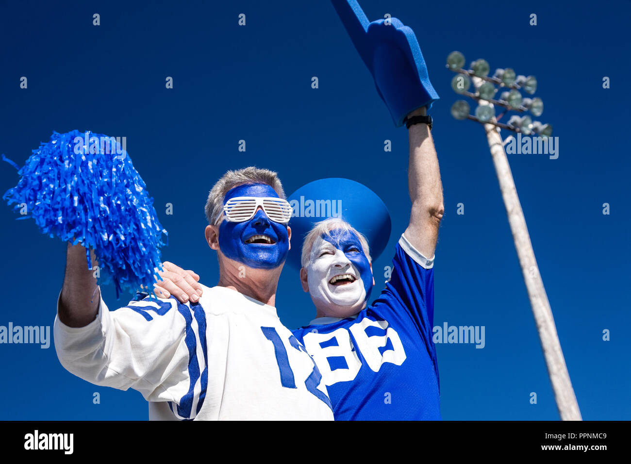 Two senior football fans hi-res stock photography and images - Alamy