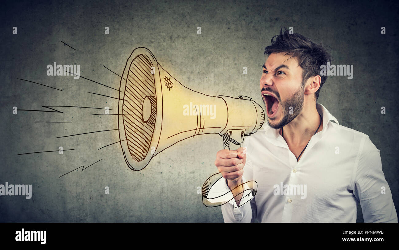 Man making loud announcement in the megaphone Stock Photo - Alamy
