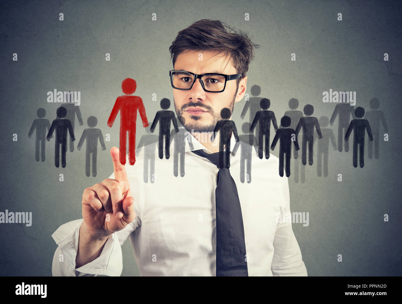 Business man making a choice for a new job opportunity from a crowd of ...