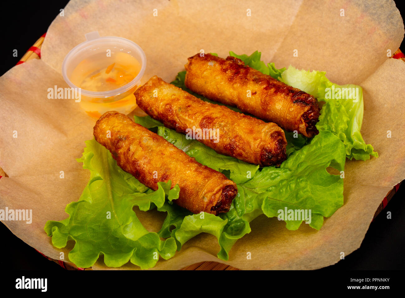 Vietnamese cuisine - Dip fried spring roll Stock Photo - Alamy