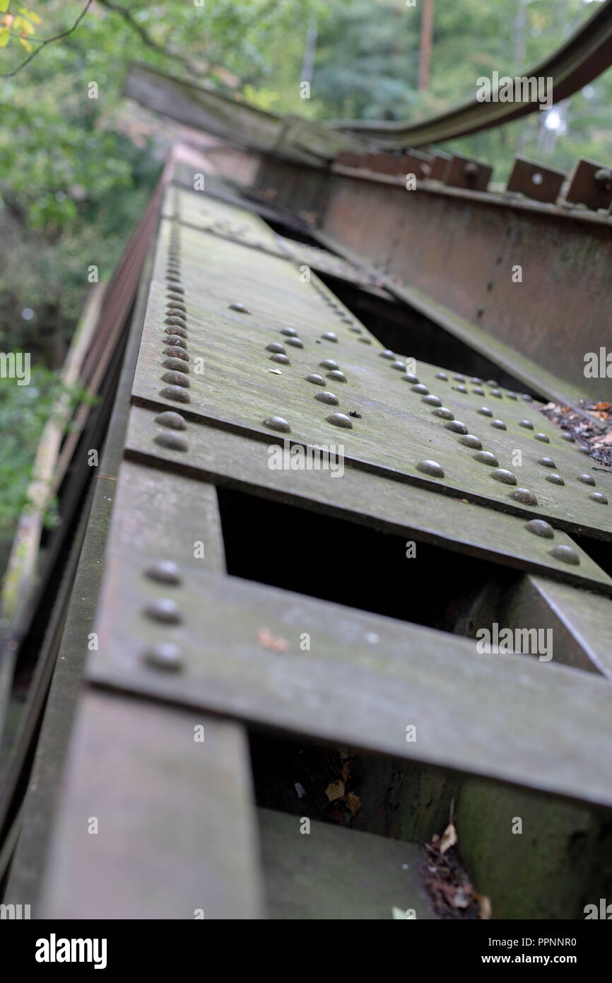 The old truss of the railway bridge. Steel construction connected by ...