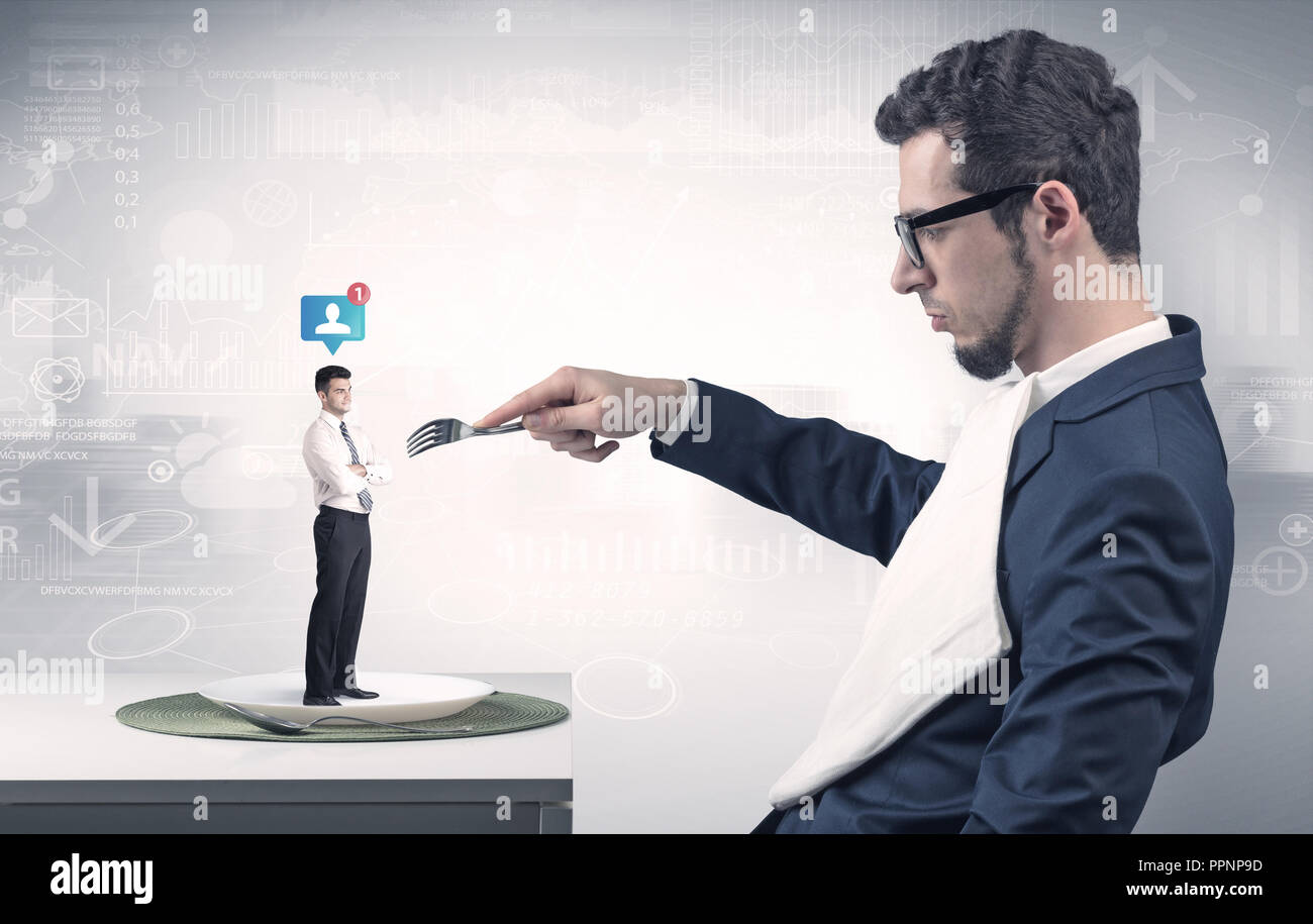 Giant businessman eating small man with financial background Stock ...