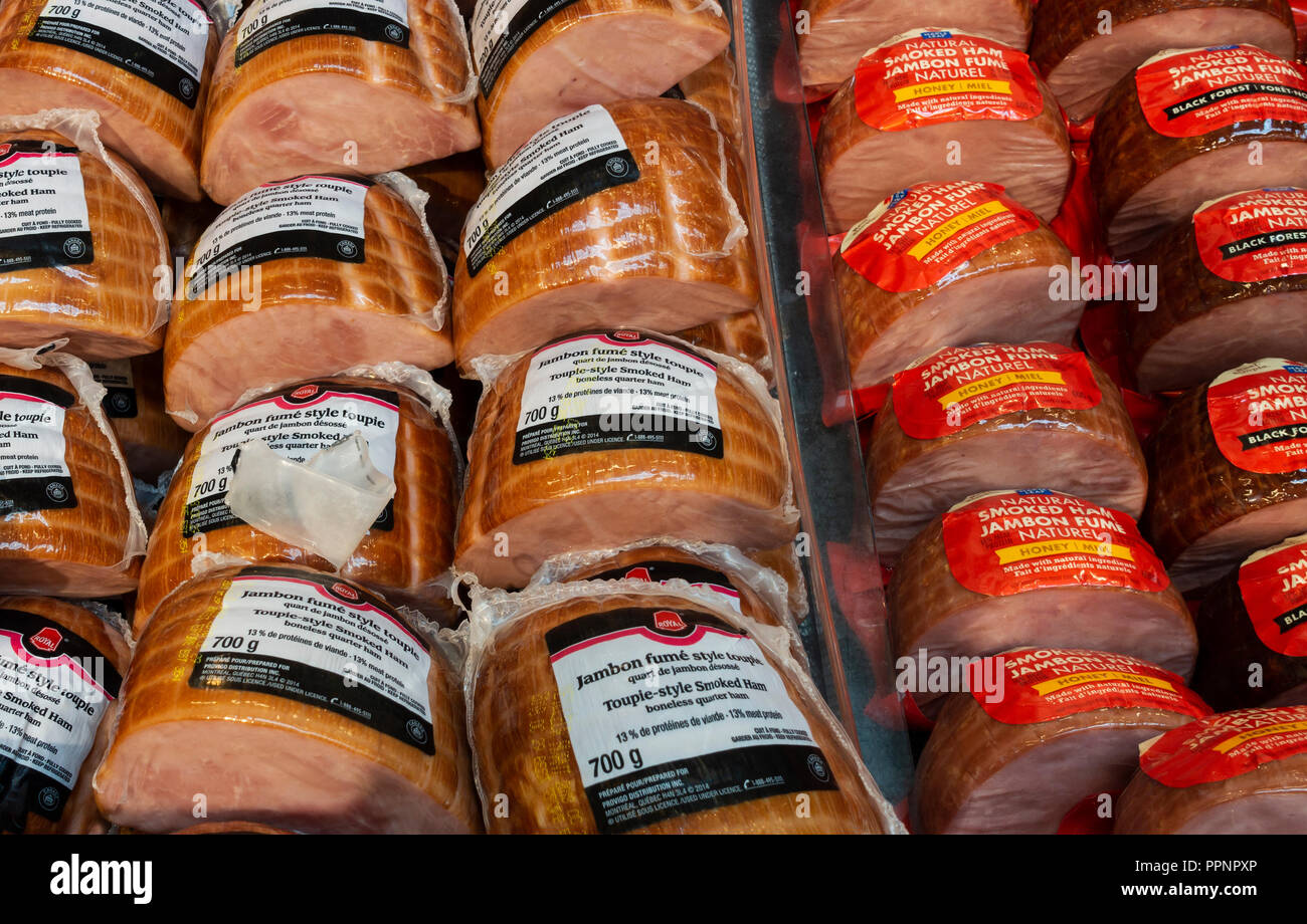 Smoked hams on display in a Montreal supermarket Stock Photo - Alamy