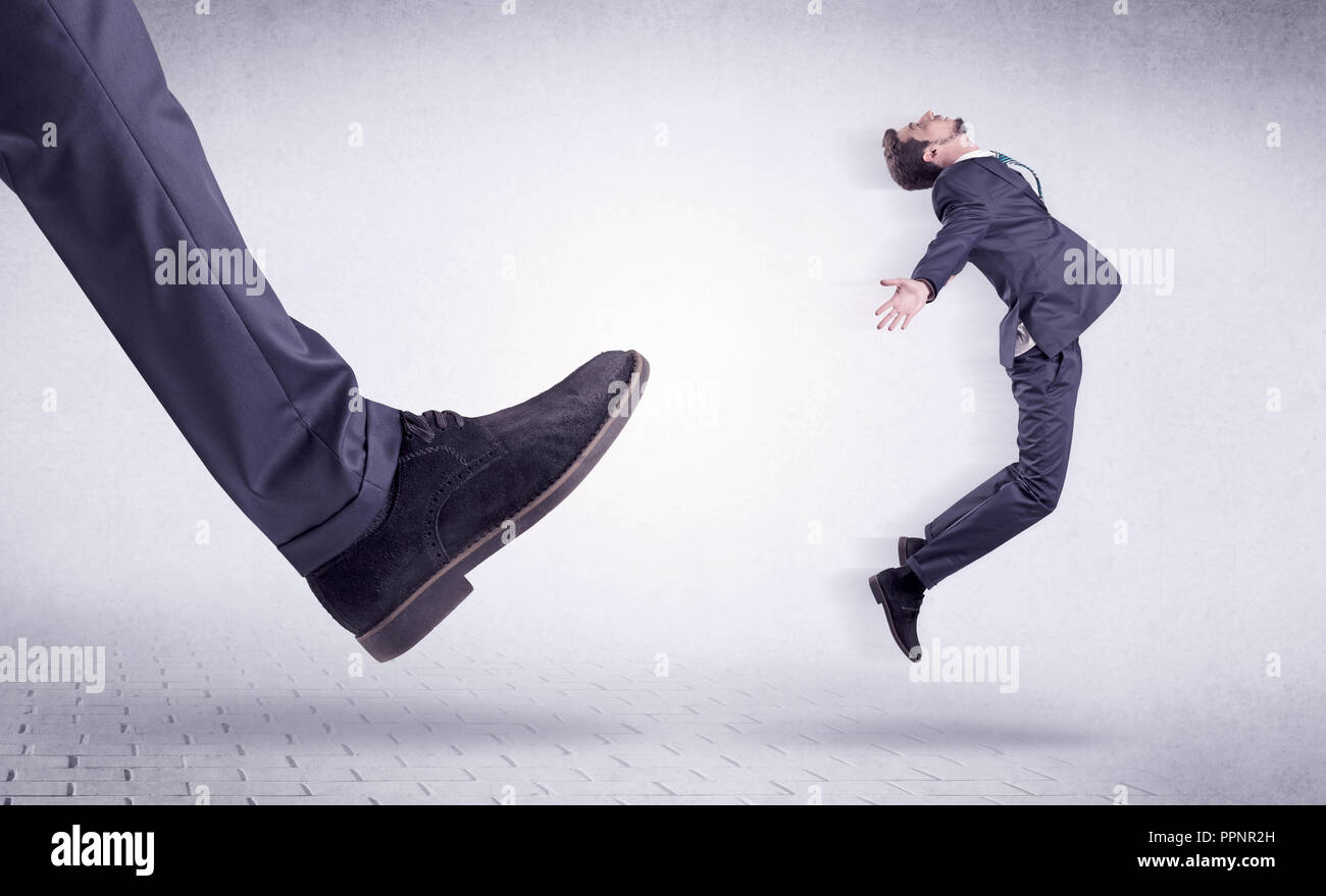 Businessman foot kicking hi-res stock photography and images - Alamy