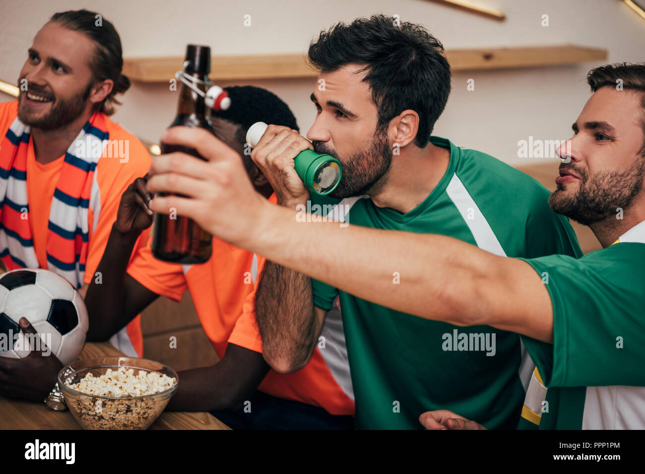Orange and green football shirts hi-res stock photography and images ...