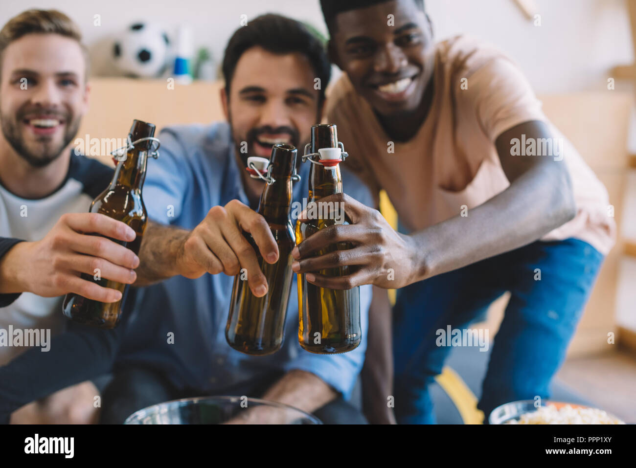 Clink bottles black man hi-res stock photography and images - Alamy