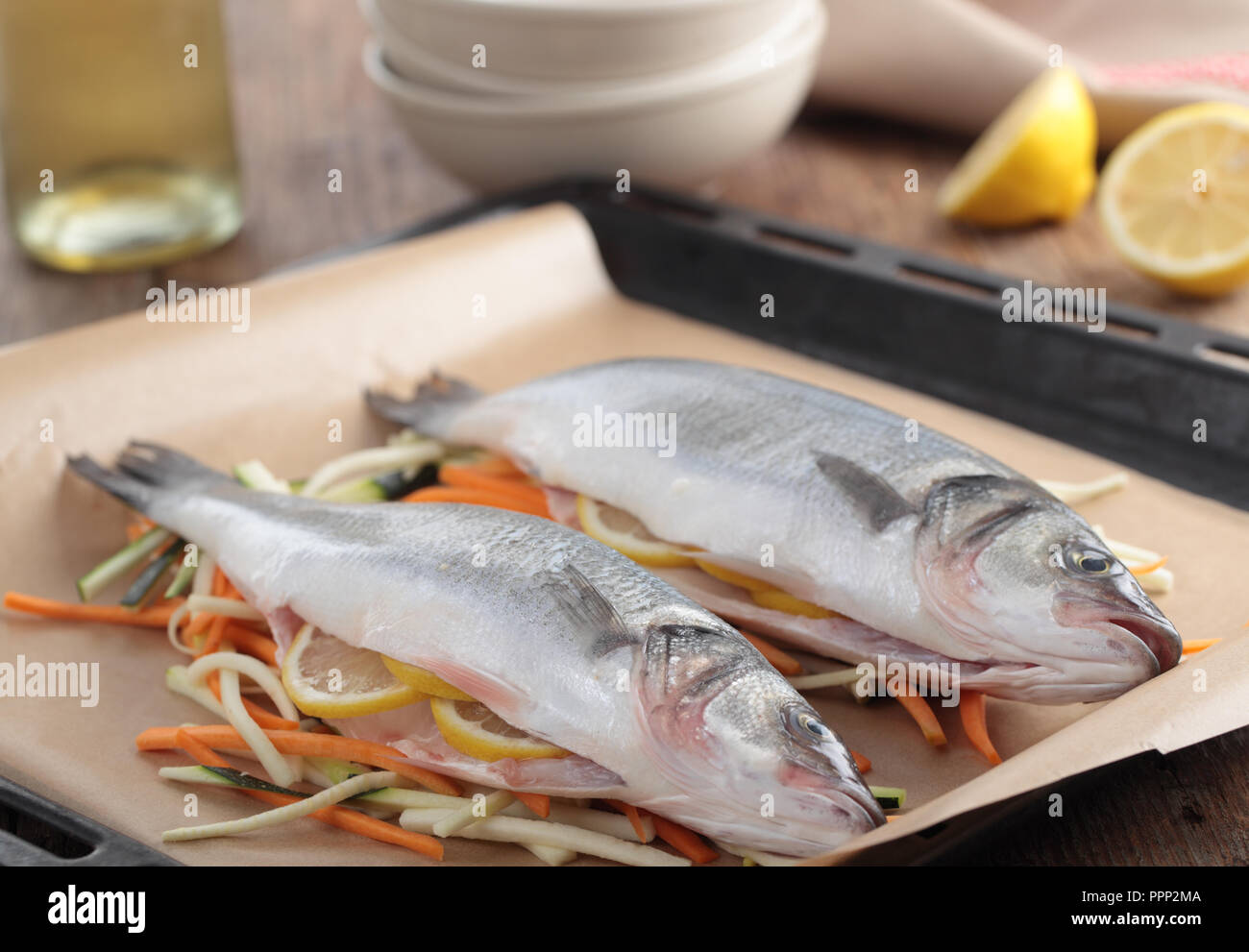 Raw sea bass hi-res stock photography and images - Alamy