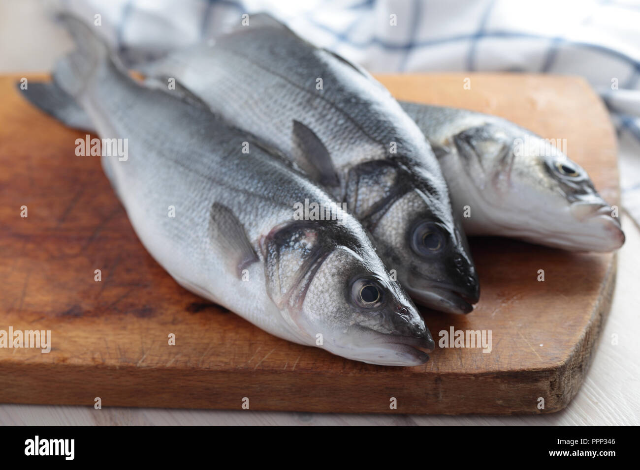 Raw sea bass hi-res stock photography and images - Alamy