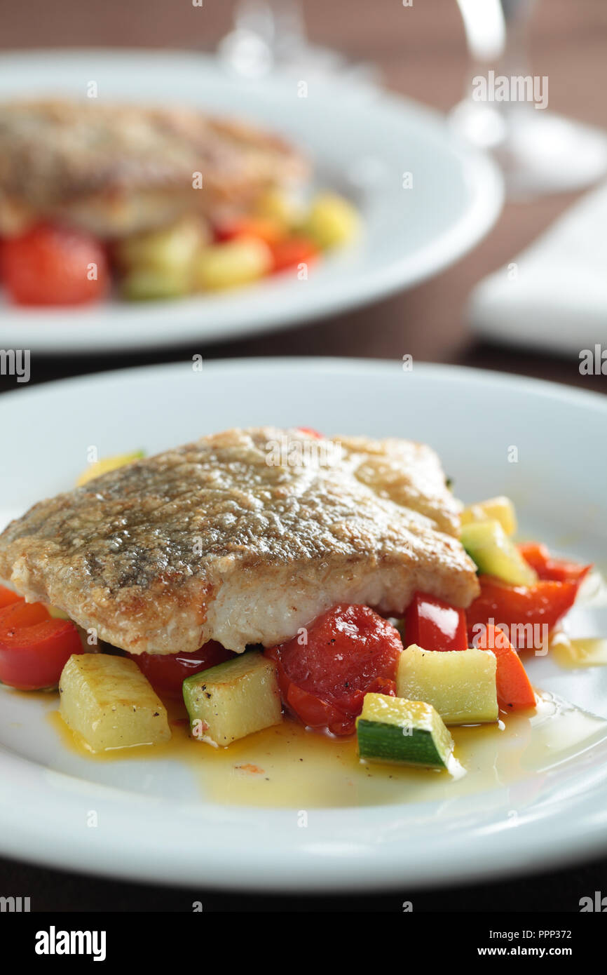 Roasted pollock fillet with vegetables Stock Photo - Alamy