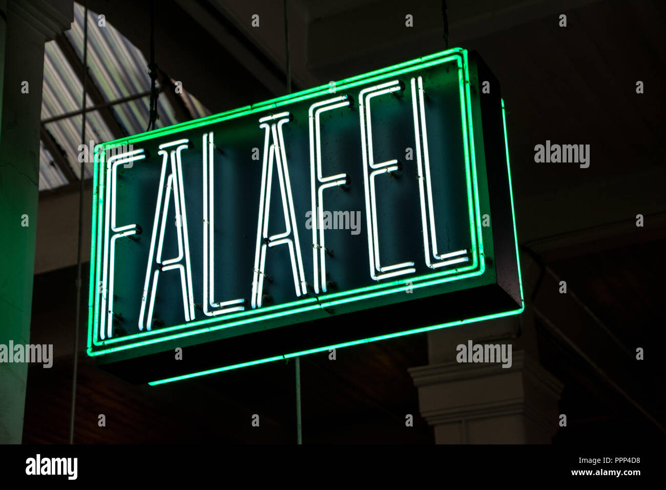 Neon sign for a falafel eatery in the Grand Central Market in downtown ...