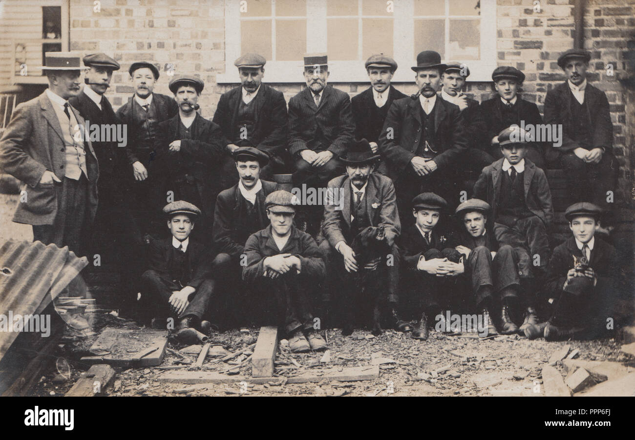 Vintage Photographic Postcard Showing a Group of Working Men and Boys ...