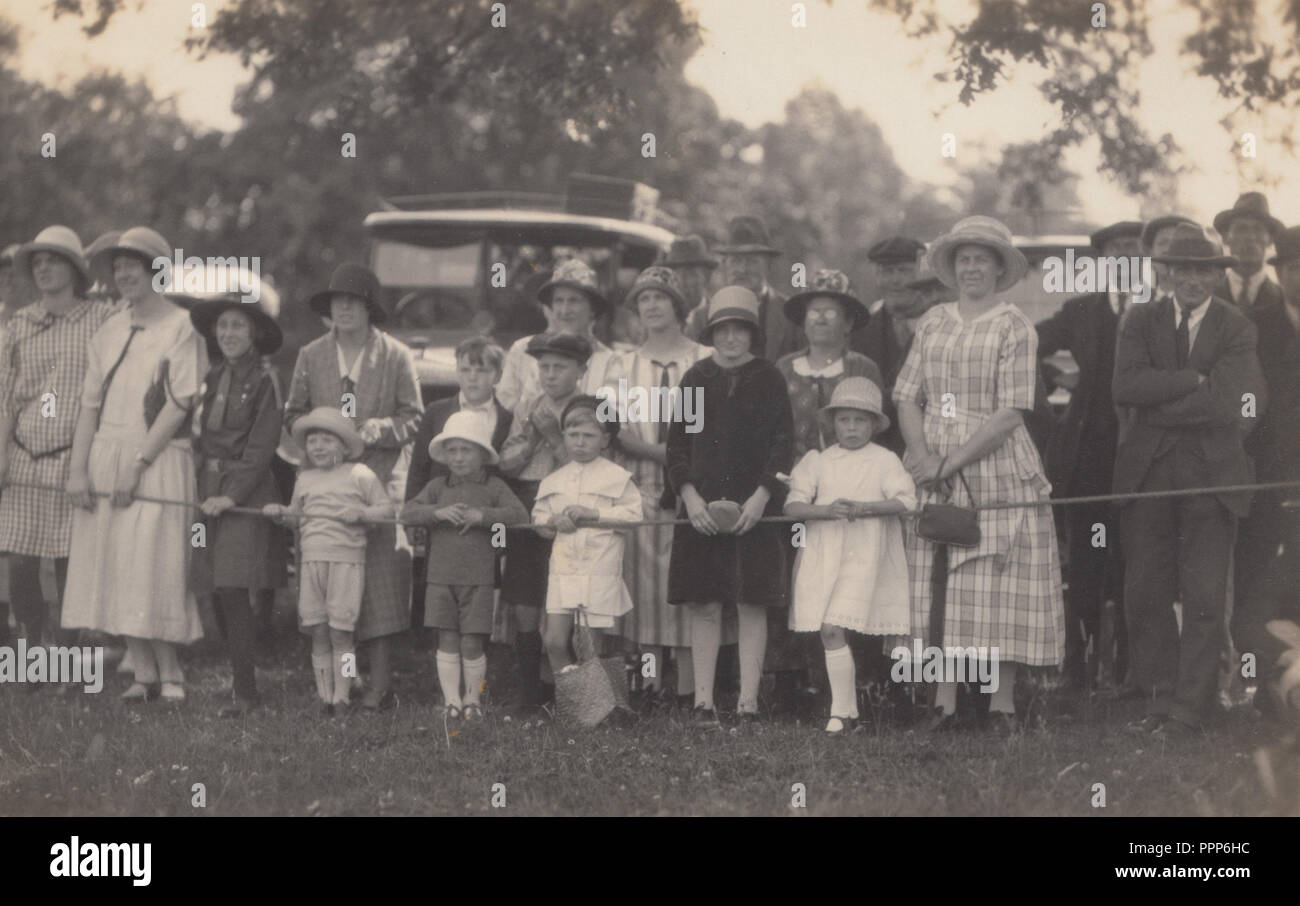 Vintage Photograph Showing a Line of Spectators Stood Behind a Rope ...