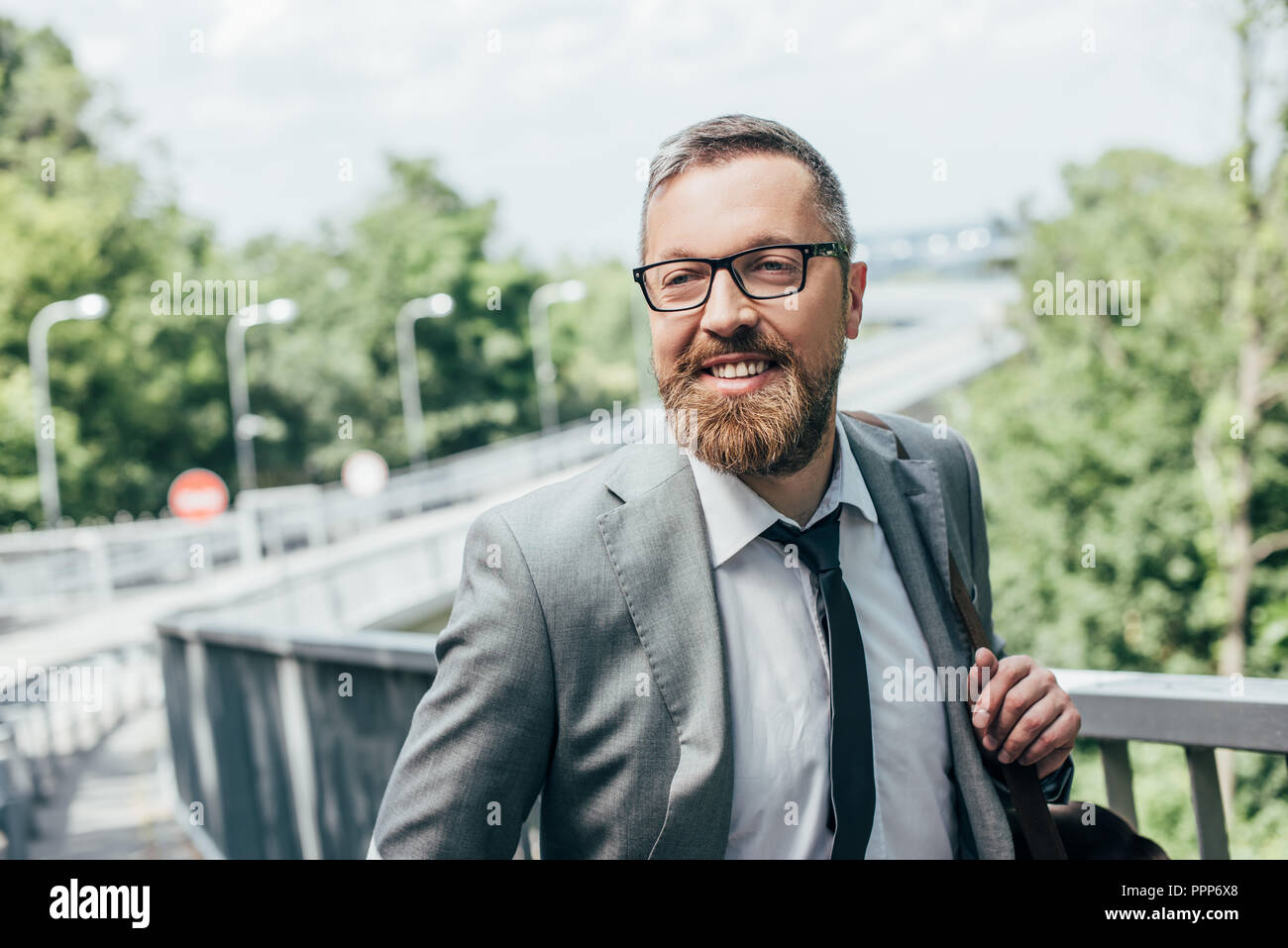 Handsome bearded man in suit hi-res stock photography and images - Alamy
