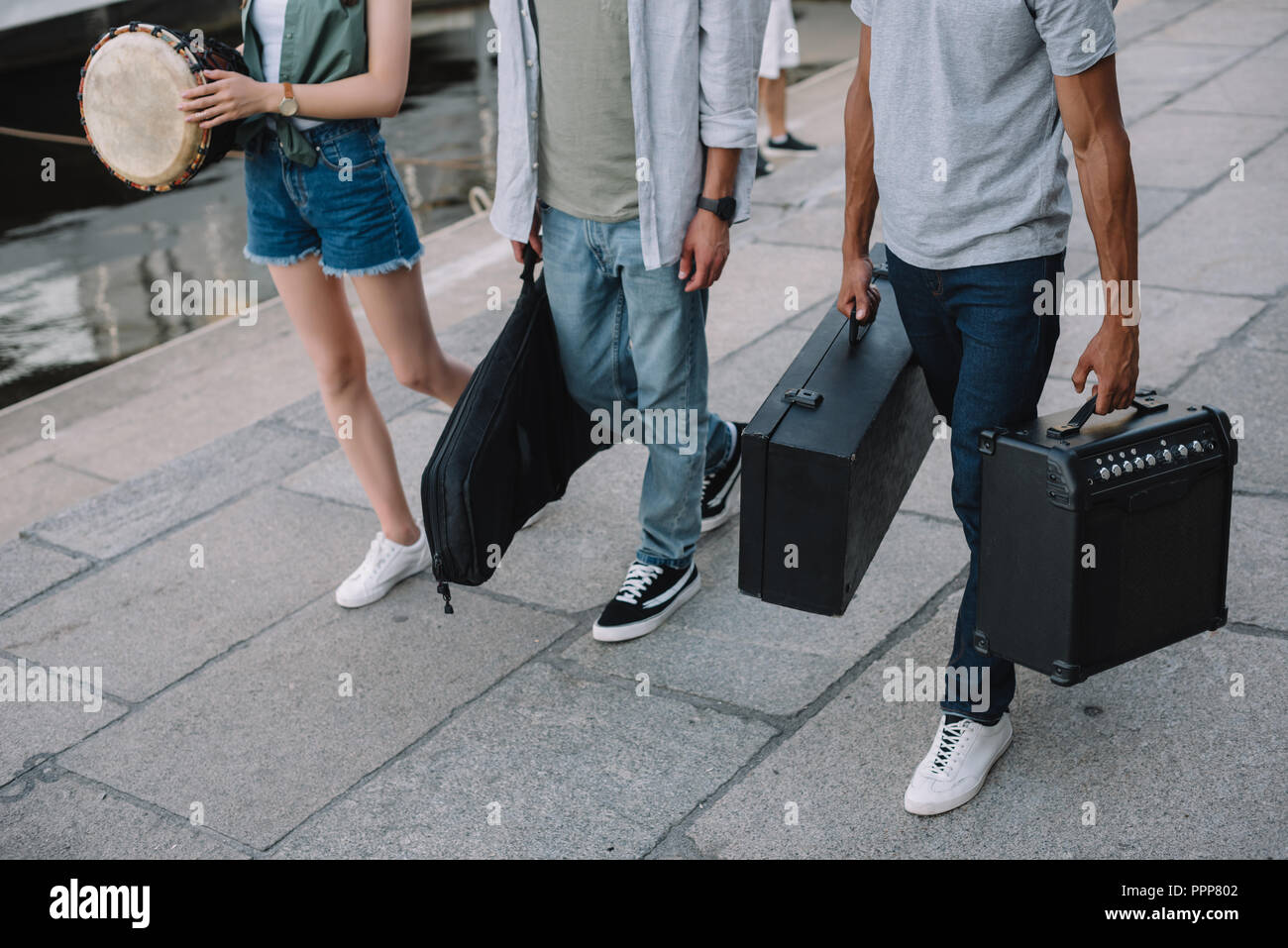 Men walking playing musical instruments hi-res stock photography and ...