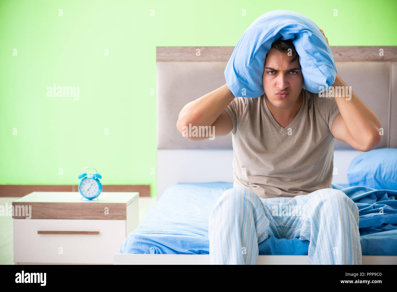 Man suffering from sleeping disorder and insomnia Stock Photo - Alamy