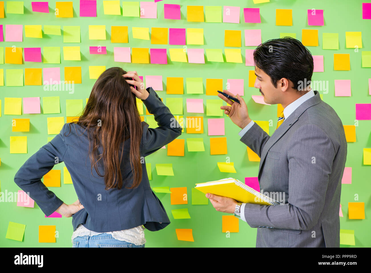 Business colleagues discussing future priorities Stock Photo - Alamy