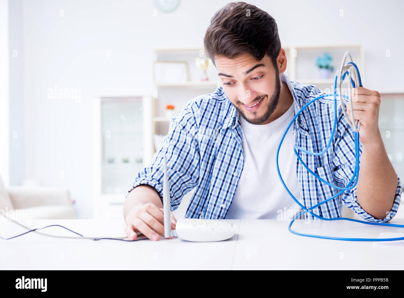 Man enjoying fast internet connection Stock Photo - Alamy