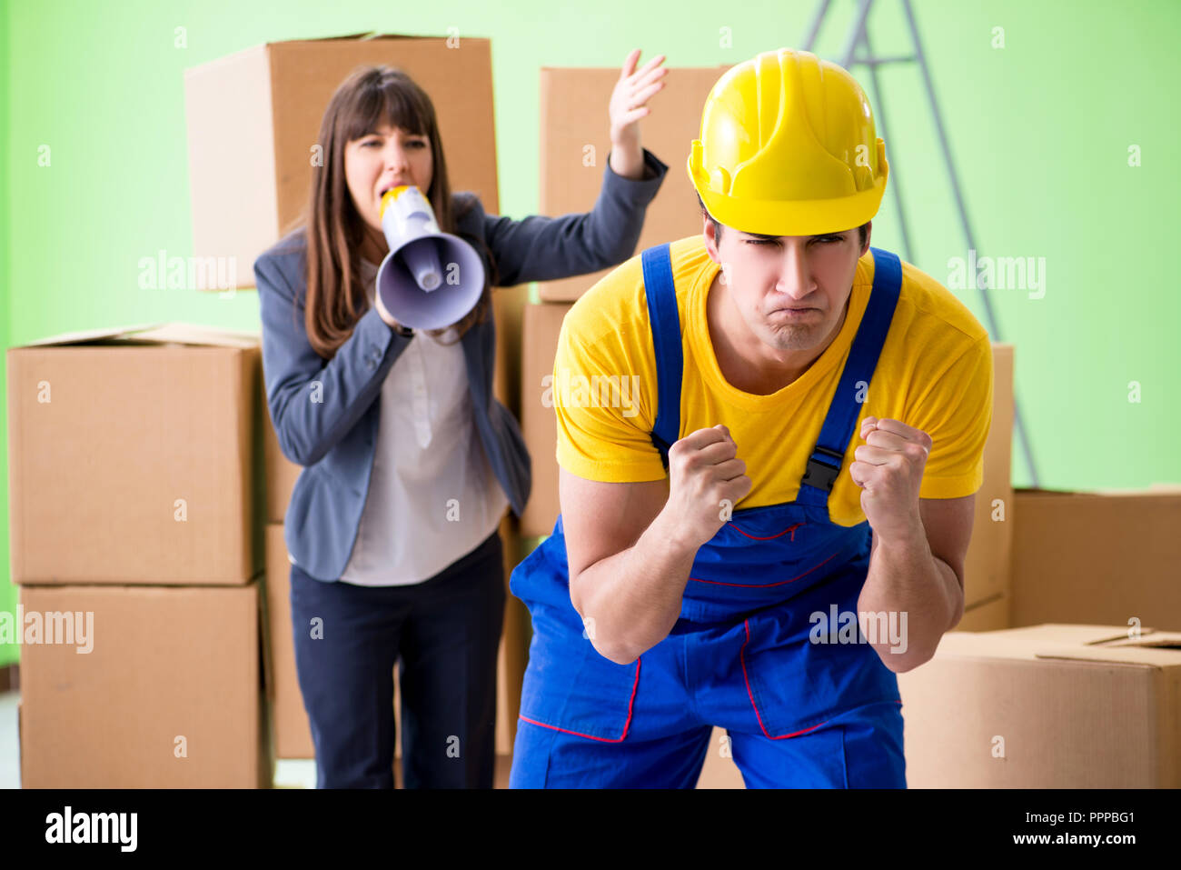 Woman boss and man contractor working with boxes delivery Stock Photo ...