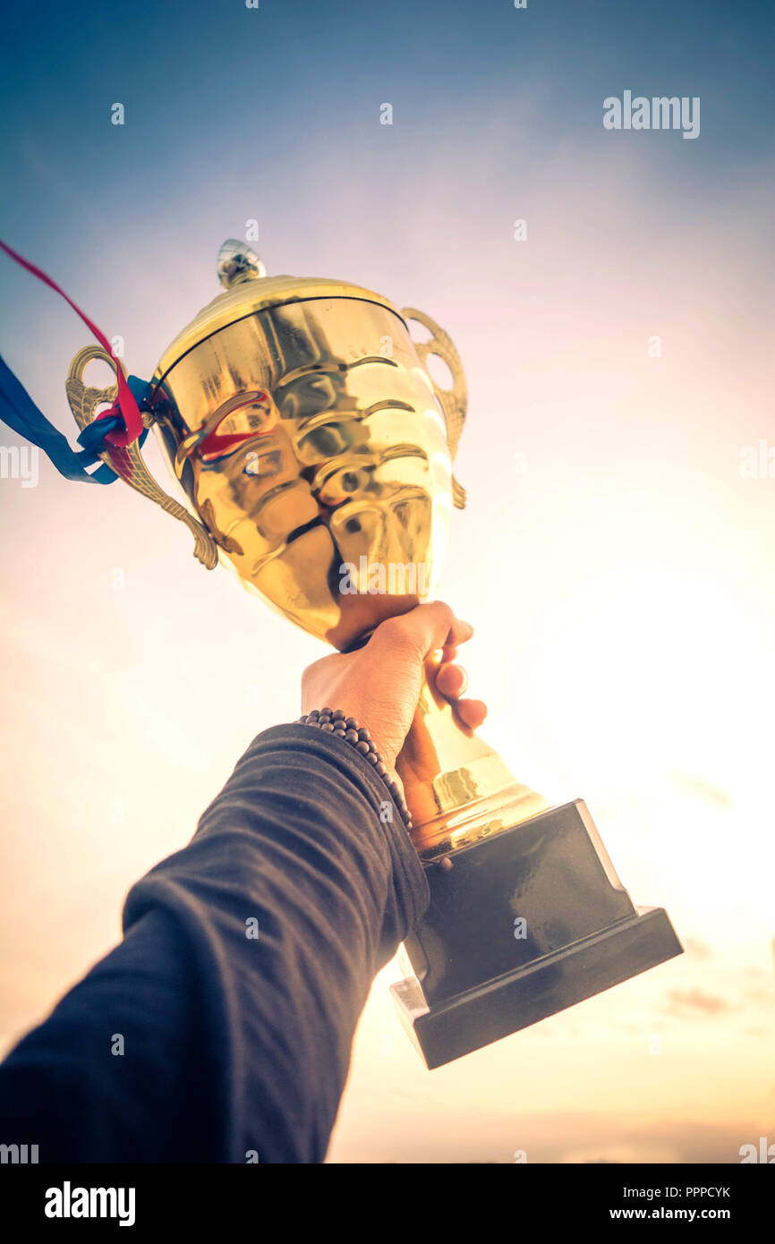 Hand Holding An Award High Resolution Stock Photography and Images - Alamy