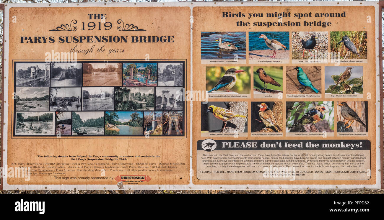 Plaque at the historic suspension bridge over part of the Vaal River ...