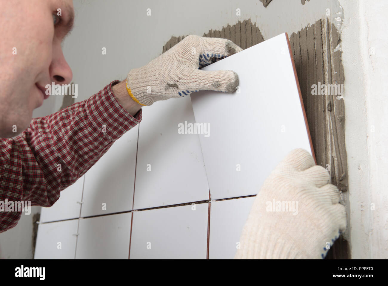 Installing white ceramic wall hi-res stock photography and images - Alamy