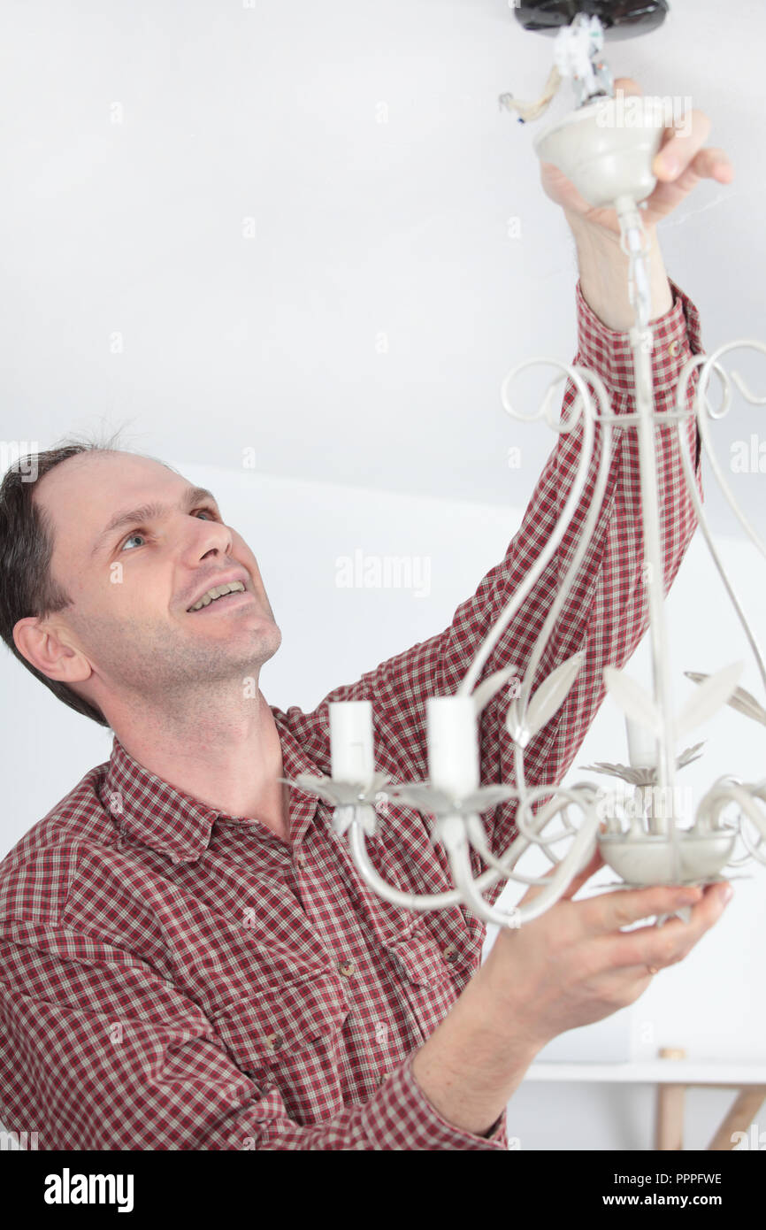 Working chandelier hi-res stock photography and images - Alamy