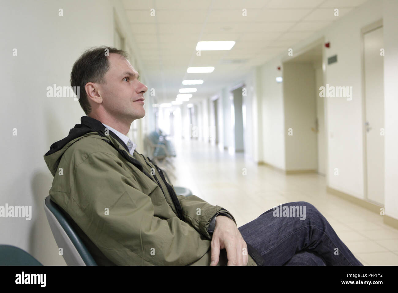 Patient waiting in the clinic for doctor appointment Stock Photo - Alamy