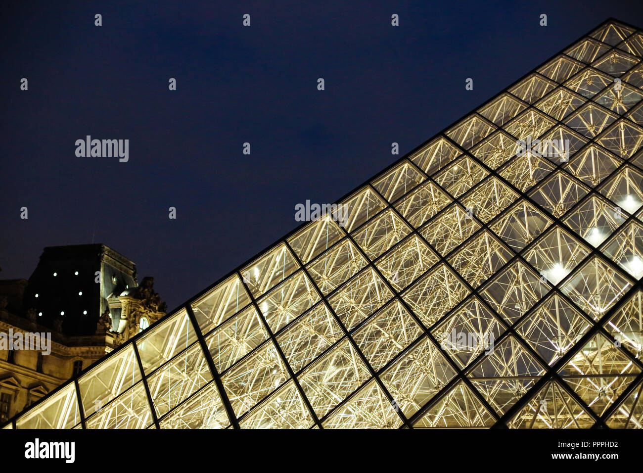 Close up Louvre amazing glass pyramid in night Paris, France Stock ...