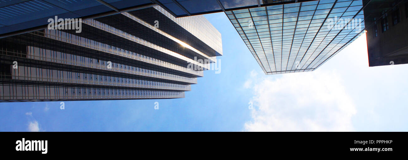 Banner of skyscrapers view from below in blue sky background Stock ...