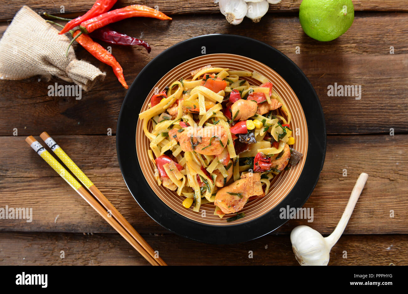 Traditional indonesian meal bami goreng with noodles, vegetables and ...