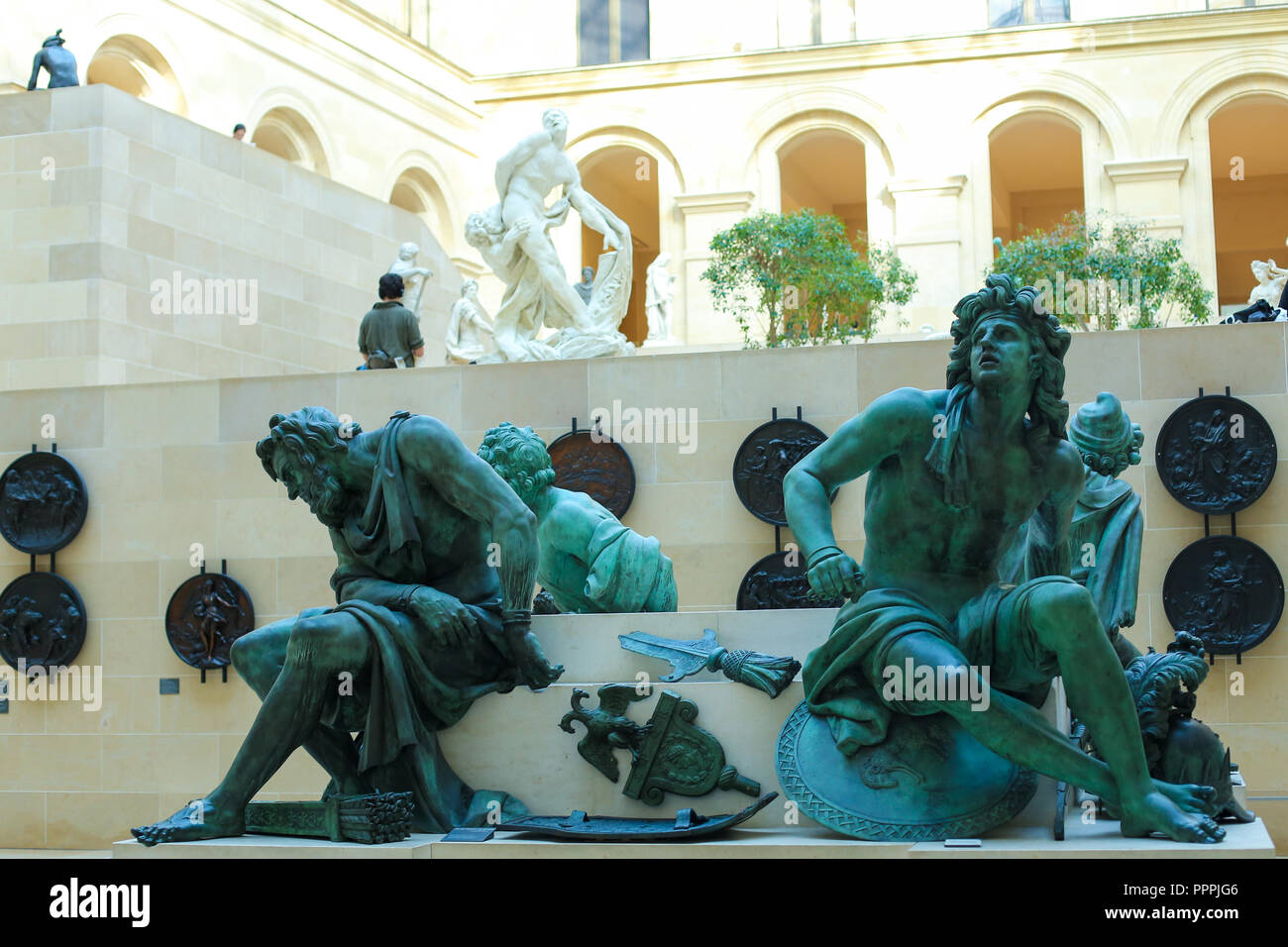 Four Captives Sculpture in Louvre Museum in Paris, France Stock Photo ...