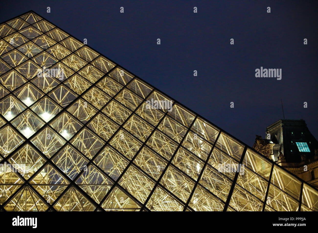 Close up Louvre nice glass pyramid in night Paris, France Stock Photo ...