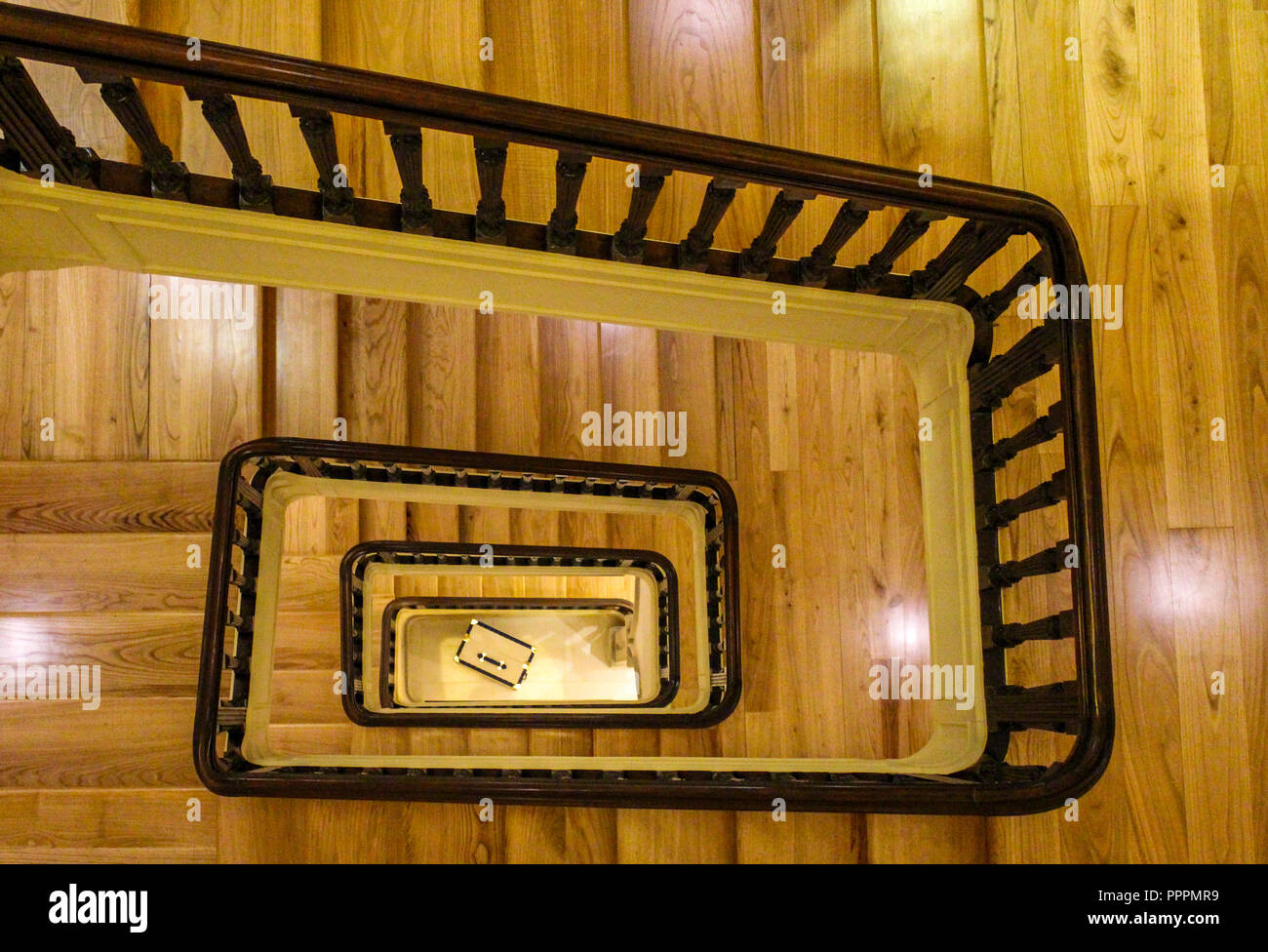 Loop of wooden staircases and wooden floor Stock Photo - Alamy