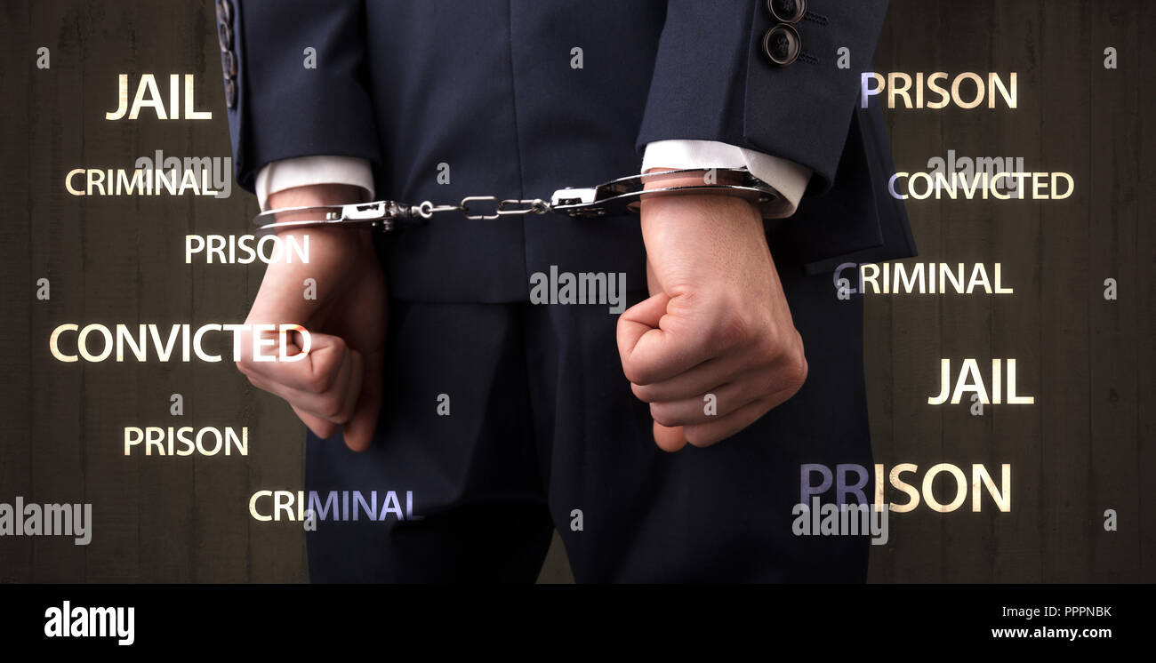 Jail convicted prison criminal labels with close handcuffed man Stock ...
