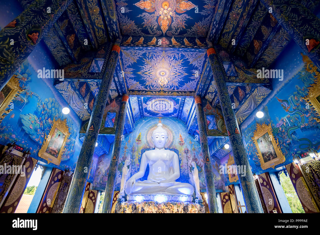 June 4, 2018, Chiang Mai, Thailand: interior of vibrant Wat Rong Suea ...