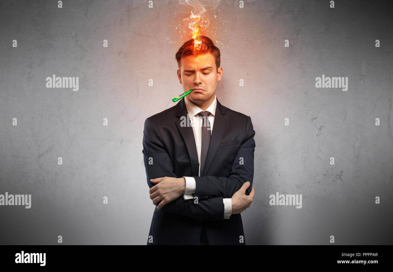 Fever businessman with burning head concept Stock Photo - Alamy