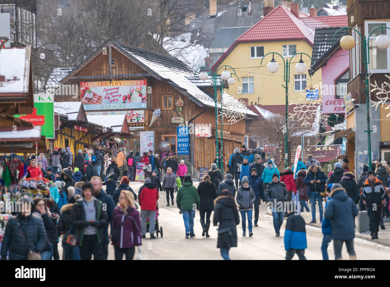 Karpacz, Poland - February 2018 : Crowd of tourists walking on the main ...