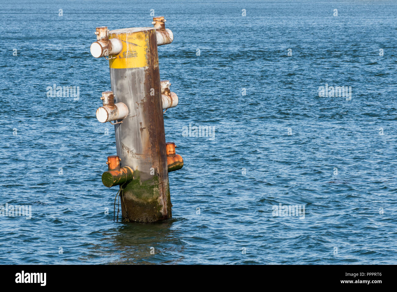 Rusty dock pole in sea hi-res stock photography and images - Alamy