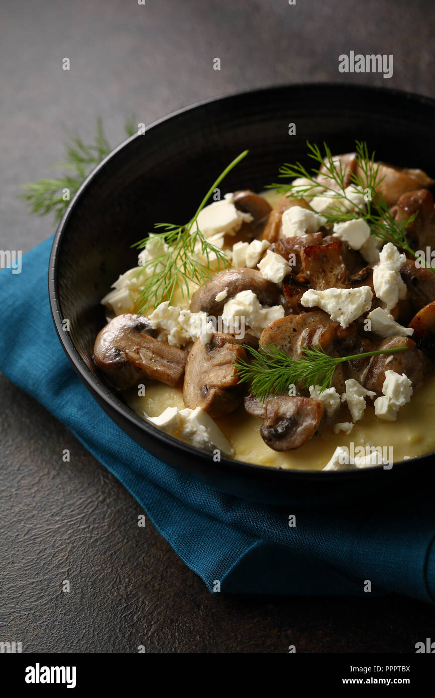 Banosh with cheese Stock Photo - Alamy